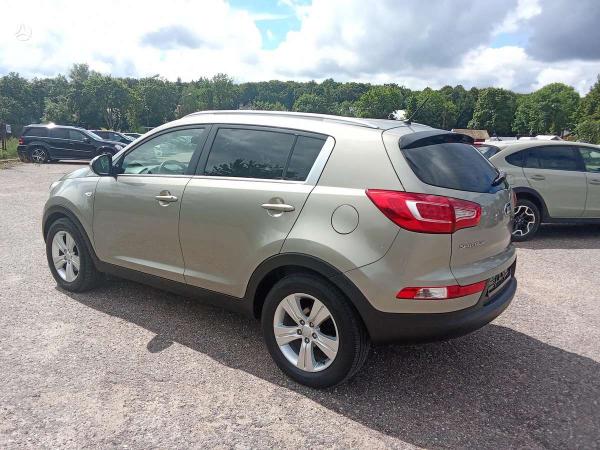 Brown Kia Sportage 2014 in Alytus, with an engine capacity of 1.69 L and mileage of 280 thousand km for 6700 €, photo 8 on AUTOMOTO.COM.LV