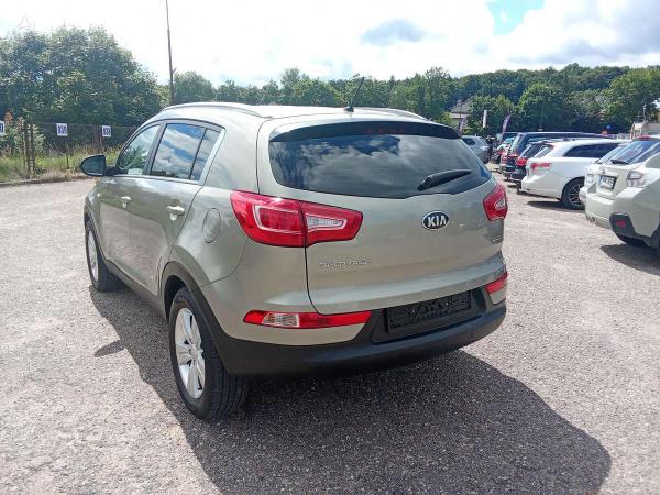 Brown Kia Sportage 2014 in Alytus, with an engine capacity of 1.69 L and mileage of 280 thousand km for 6700 €, photo 9 on AUTOMOTO.COM.LV