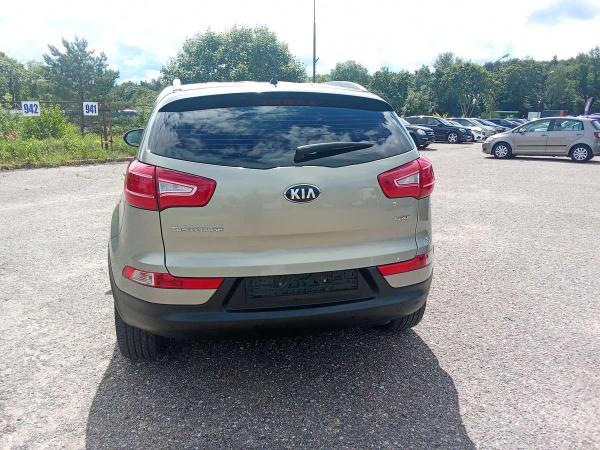 Brown Kia Sportage 2014 in Alytus, with an engine capacity of 1.69 L and mileage of 280 thousand km for 6700 €, photo 10 on AUTOMOTO.COM.LV
