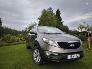 Brūns Kia Sportage 2014 Mažeikiai, ar dzinēja tilpumu 1.69 L un nobraukumu 193 tūkst. km par 7900 €, foto  vietnē AUTOMOTO.COM.LV