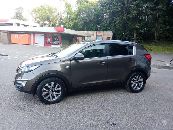 Brūns Kia Sportage 2014 Alīta, ar dzinēja tilpumu 1.69 L un nobraukumu 273 tūkst. km par 7200 €, foto 4 vietnē AUTOMOTO.COM.LV