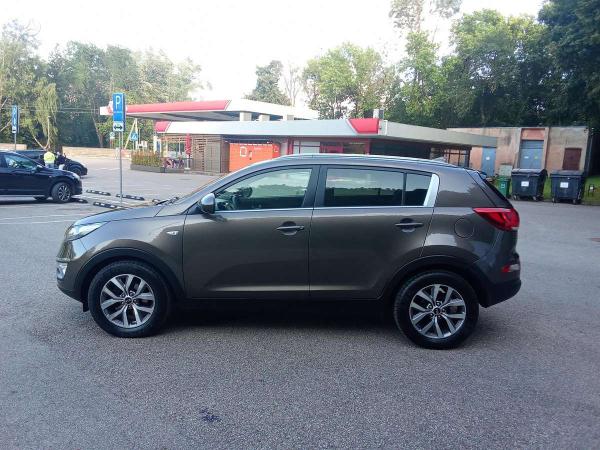 Brūns Kia Sportage 2014 Alīta, ar dzinēja tilpumu 1.69 L un nobraukumu 273 tūkst. km par 7200 €, foto 5 vietnē AUTOMOTO.COM.LV