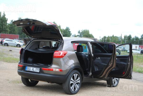 Коричневый Киа Sportage 2014 в Рига, объемом двигателя 2.00 л и пробегом 235 тыс. км за 7990 €, фото 7 на AUTOMOTO.COM.LV