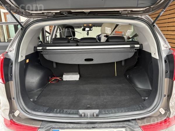 Brown Kia Sportage 2015 in Riga, with an engine capacity of 2.00 L and mileage of 192 thousand km for 8800 €, photo 6 on AUTOMOTO.COM.LV
