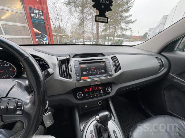 Brown Kia Sportage 2015 in Riga, with an engine capacity of 2.00 L and mileage of 192 thousand km for 8800 €, photo 9 on AUTOMOTO.COM.LV