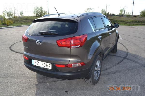 Brown Kia Sportage 2015 in Daugavpils, with an engine capacity of 1.60 L and mileage of 100 thousand km for 9150 €, photo 5 on AUTOMOTO.COM.LV
