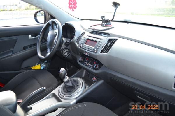 Brown Kia Sportage 2015 in Daugavpils, with an engine capacity of 1.60 L and mileage of 100 thousand km for 9150 €, photo 6 on AUTOMOTO.COM.LV