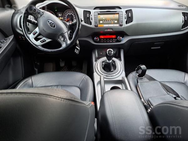 Brūns Kia Sportage 2015 Rīga, ar dzinēja tilpumu 1.70 L un nobraukumu 123 tūkst. km par 9000 €, foto 5 vietnē AUTOMOTO.COM.LV