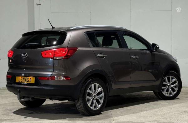 Brown Kia Sportage 2015 in Klaipeda, with an engine capacity of 2.00 L and mileage of 192 thousand km for 5999 €, photo 4 on AUTOMOTO.COM.LV