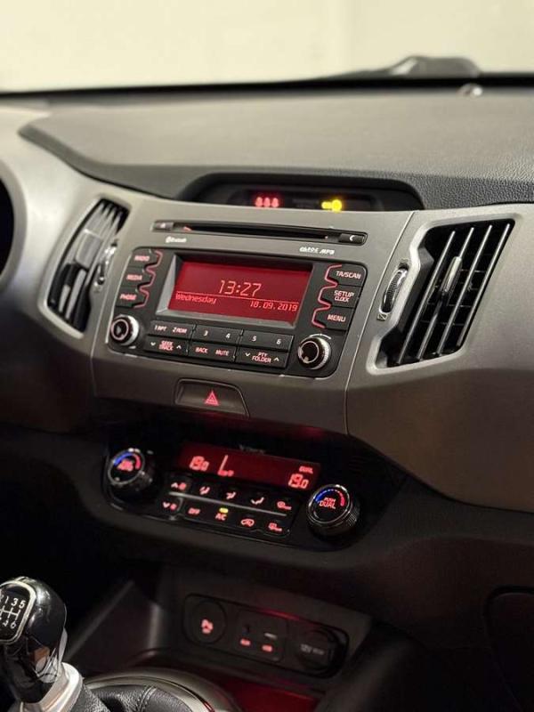 Brown Kia Sportage 2015 in Klaipeda, with an engine capacity of 2.00 L and mileage of 192 thousand km for 5999 €, photo 11 on AUTOMOTO.COM.LV