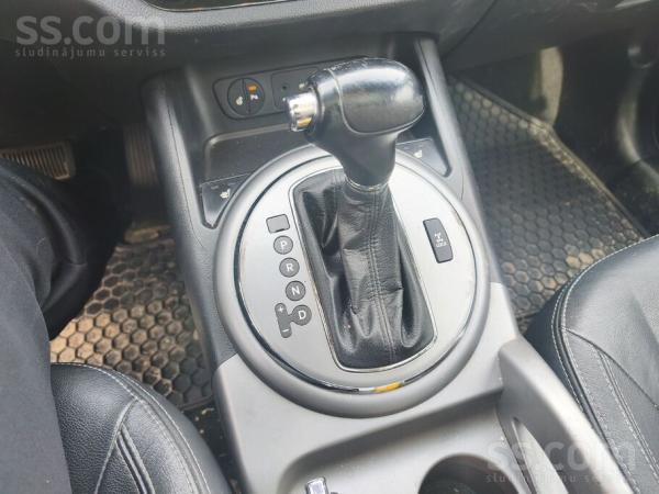 Brown Kia Sportage 2015 in Riga, with an engine capacity of 2.00 L and mileage of 306 thousand km for 7000 €, photo 8 on AUTOMOTO.COM.LV