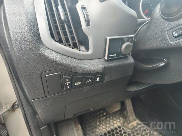 Brown Kia Sportage 2015 in Riga, with an engine capacity of 2.00 L and mileage of 306 thousand km for 7000 €, photo 9 on AUTOMOTO.COM.LV
