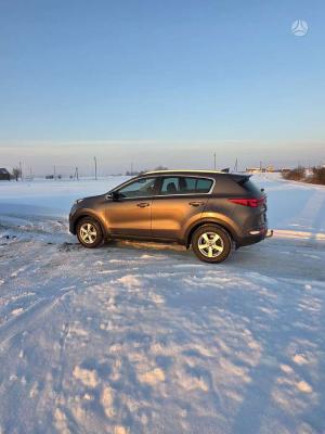 Brown Kia Sportage 2016 in Alytus, with an engine capacity of 1.69 L and mileage of 229 thousand km for 10800 €, photo  on AUTOMOTO.COM.LV