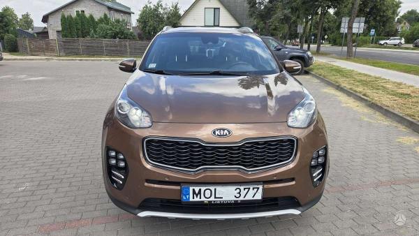 Brown Kia Sportage 2016 in Utena, with an engine capacity of 2.00 L and mileage of 184 thousand km for 11950 €, photo 5 on AUTOMOTO.COM.LV