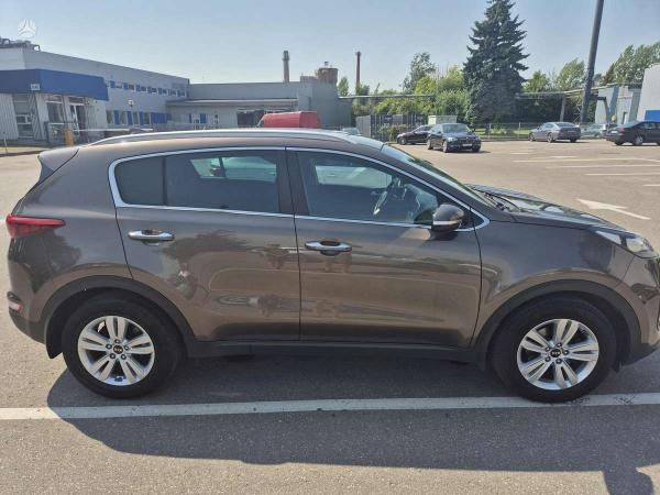 Brown Kia Sportage 2016 in Kaunas, with an engine capacity of 1.69 L and mileage of 159 thousand km for 10900 €, photo 3 on AUTOMOTO.COM.LV