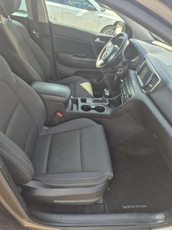 Brown Kia Sportage 2016 in Kaunas, with an engine capacity of 1.69 L and mileage of 159 thousand km for 10900 €, photo 10 on AUTOMOTO.COM.LV