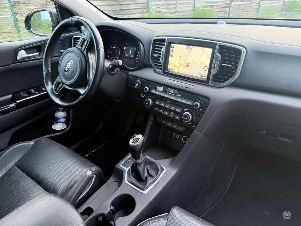 Brown Kia Sportage 2016 in Kaunas, with an engine capacity of 1.70 L and mileage of 236 thousand km for 10500 €, photo 10 on AUTOMOTO.COM.LV