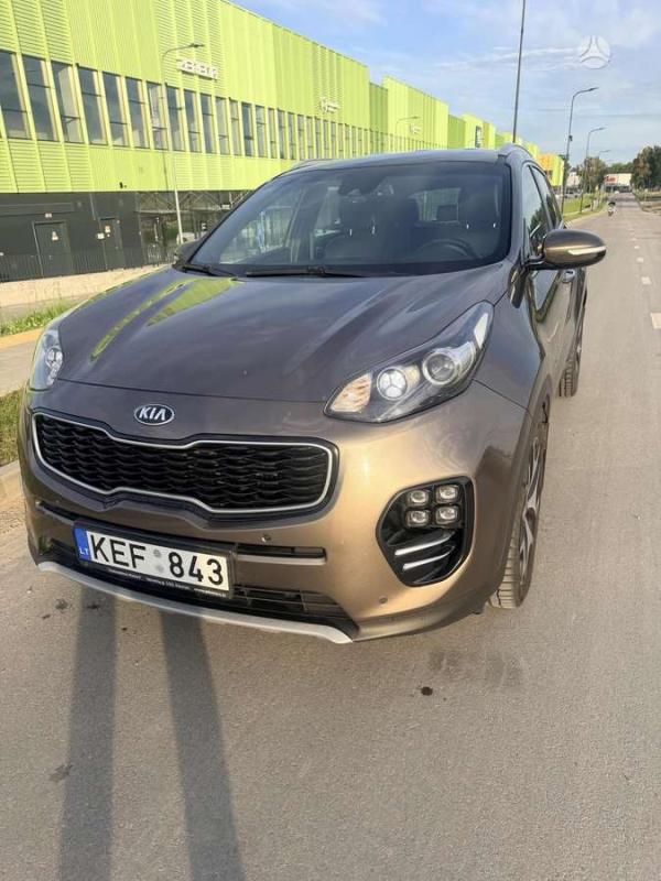 Brown Kia Sportage 2018 in Vilnius, with an engine capacity of 1.59 L and mileage of 144 thousand km for 13900 €, photo 2 on AUTOMOTO.COM.LV