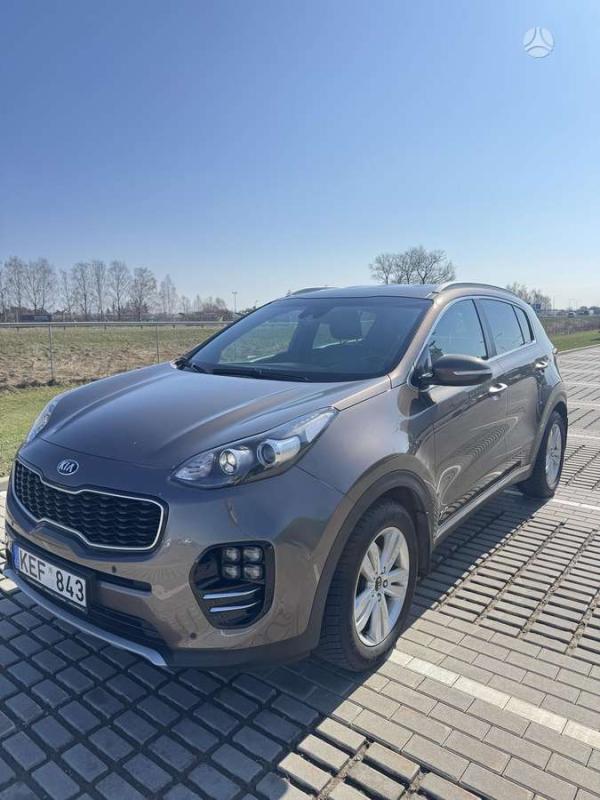 Brown Kia Sportage 2018 in Vilnius, with an engine capacity of 1.59 L and mileage of 144 thousand km for 13900 €, photo 5 on AUTOMOTO.COM.LV