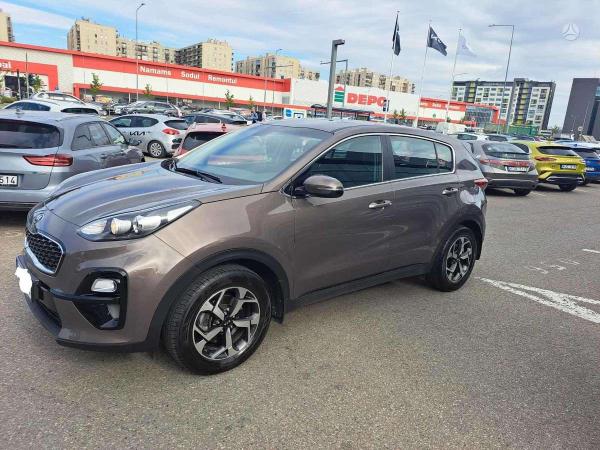 Brown Kia Sportage 2019 in Vilnius, with an engine capacity of 1.60 L and mileage of 136 thousand km for 15500 €, photo 4 on AUTOMOTO.COM.LV