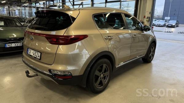 Brown Kia Sportage 2020 in Riga, with an engine capacity of 1.60 L and mileage of 77 thousand km for 15500 €, photo 4 on AUTOMOTO.COM.LV