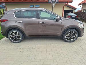Brown Kia Sportage 2020 in Kretinga, with an engine capacity of 1.60 L and mileage of 106 thousand km for 20500 €, photo  on AUTOMOTO.COM.LV