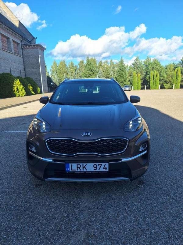Brūns Kia Sportage 2021 Alīta, ar dzinēja tilpumu 1.59 L un nobraukumu 73 tūkst. km par 19900 €, foto 1 vietnē AUTOMOTO.COM.LV