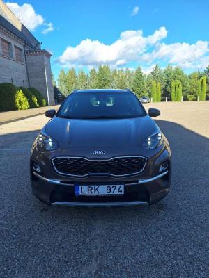 Brūns Kia Sportage 2021 Alīta, ar dzinēja tilpumu 1.59 L un nobraukumu 73 tūkst. km par 19900 €, foto  vietnē AUTOMOTO.COM.LV