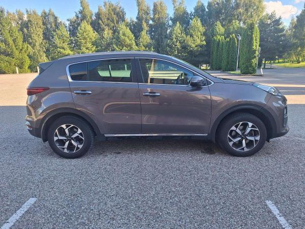 Brūns Kia Sportage 2021 Alīta, ar dzinēja tilpumu 1.59 L un nobraukumu 73 tūkst. km par 19900 €, foto 4 vietnē AUTOMOTO.COM.LV