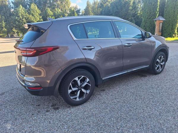 Brūns Kia Sportage 2021 Alīta, ar dzinēja tilpumu 1.59 L un nobraukumu 73 tūkst. km par 19900 €, foto 5 vietnē AUTOMOTO.COM.LV