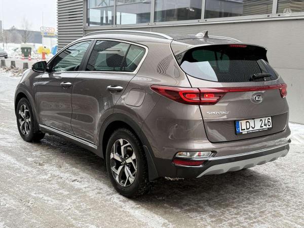 Brown Kia Sportage 2022 in Vilnius, with an engine capacity of 1.60 L and mileage of 140 thousand km for 14400 €, photo 3 on AUTOMOTO.COM.LV