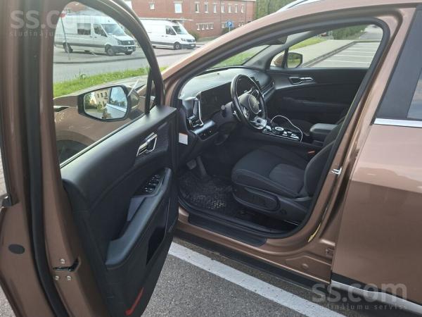 Brown Kia Sportage 2022 in Saldus, with an engine capacity of 1.60 L and mileage of 60 thousand km for 19000 €, photo 3 on AUTOMOTO.COM.LV