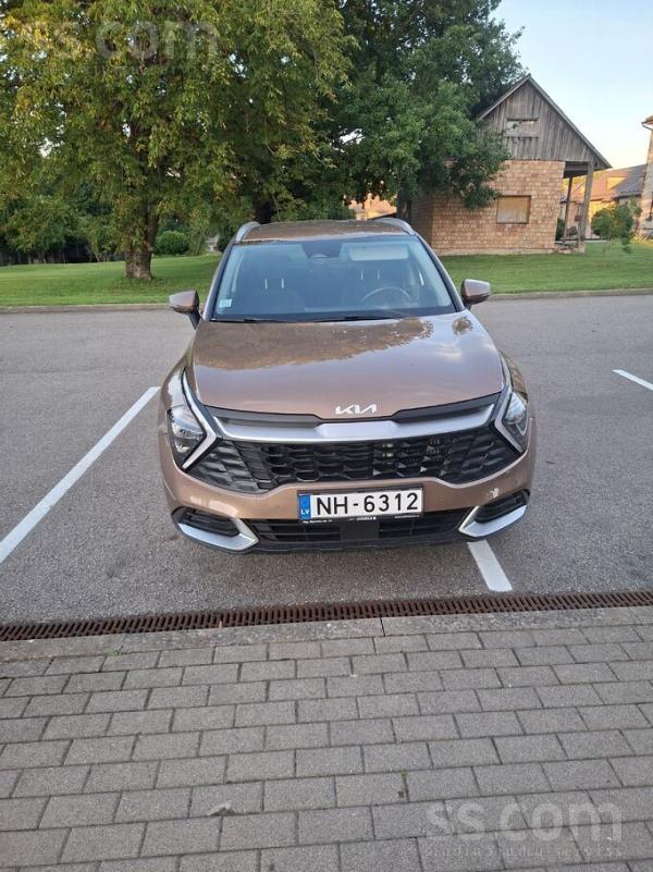 Brown Kia Sportage 2022 in Saldus, with an engine capacity of 1.60 L and mileage of 60 thousand km for 19000 €, photo 4 on AUTOMOTO.COM.LV