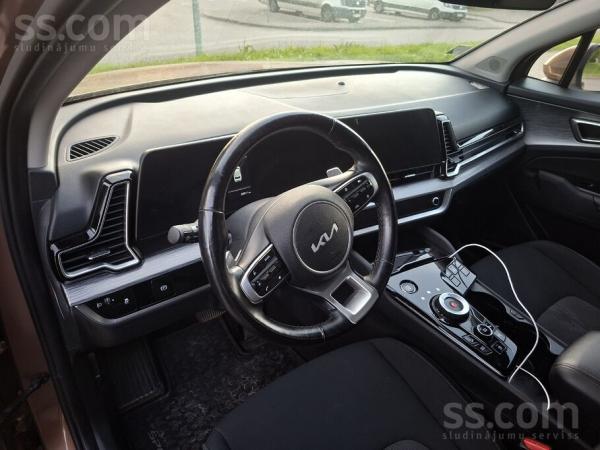 Brown Kia Sportage 2022 in Saldus, with an engine capacity of 1.60 L and mileage of 60 thousand km for 19000 €, photo 10 on AUTOMOTO.COM.LV