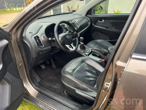 Коричневый Киа Sportage 2010 в Балви, объемом двигателя 2.00 л и пробегом 289 тыс. км за 8800 €, фото 7 на AUTOMOTO.COM.LV