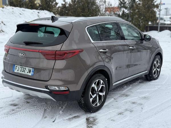 Brown Kia Sportage 2019 in Taurage, with an engine capacity of 1.60 L and mileage of 178 thousand km for 10700 €, photo 4 on AUTOMOTO.COM.LV