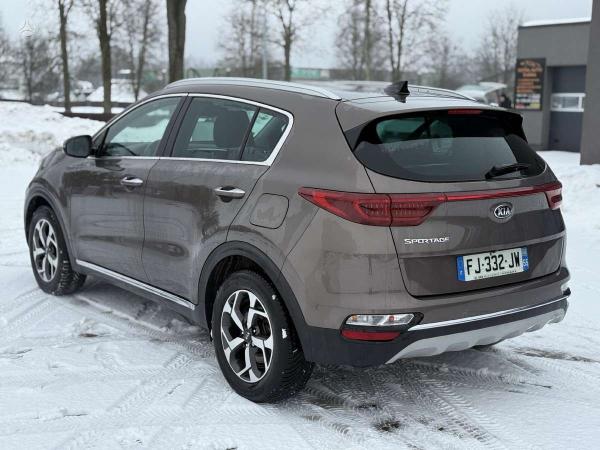 Brown Kia Sportage 2019 in Taurage, with an engine capacity of 1.60 L and mileage of 178 thousand km for 10700 €, photo 5 on AUTOMOTO.COM.LV