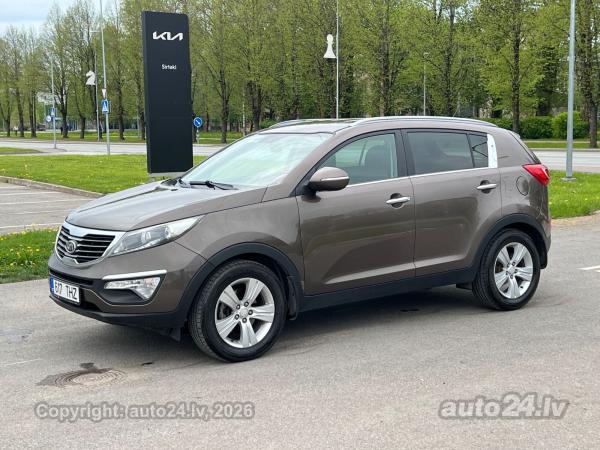 Brown Kia Sportage 2010 in Narva, with an engine capacity of 2.00 L and mileage of 228 thousand km for 4999 €, photo 1 on AUTOMOTO.COM.LV