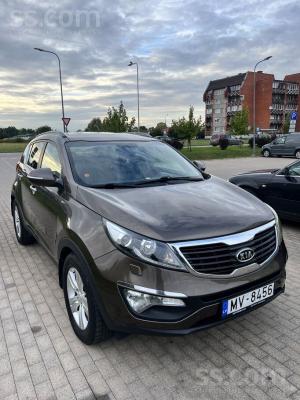Brown Kia Sportage 2011 in Jelgava, with an engine capacity of 2.00 L and mileage of 213 thousand km for 5900 €, photo  on AUTOMOTO.COM.LV