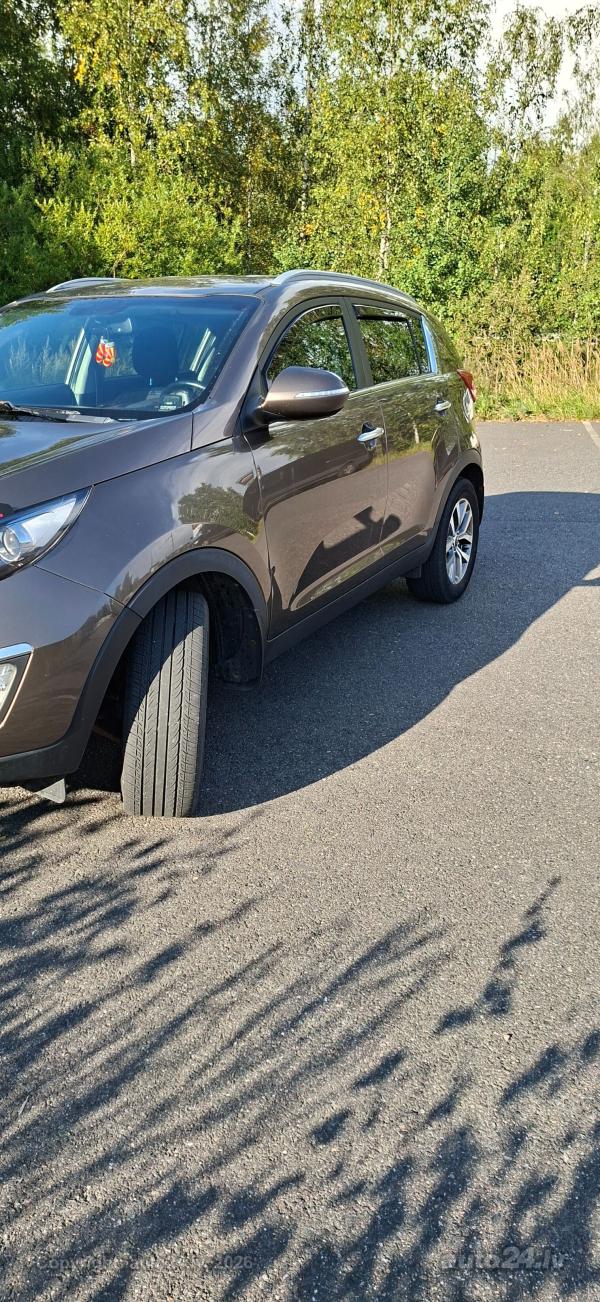 Brūns Kia Sportage 2015 Tallina, ar dzinēja tilpumu 2.00 L un nobraukumu 125 tūkst. km par 9995 €, foto 2 vietnē AUTOMOTO.COM.LV