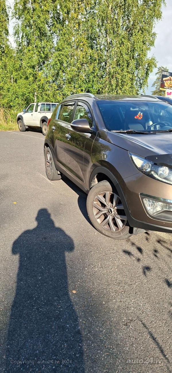Brūns Kia Sportage 2015 Tallina, ar dzinēja tilpumu 2.00 L un nobraukumu 125 tūkst. km par 9995 €, foto 3 vietnē AUTOMOTO.COM.LV