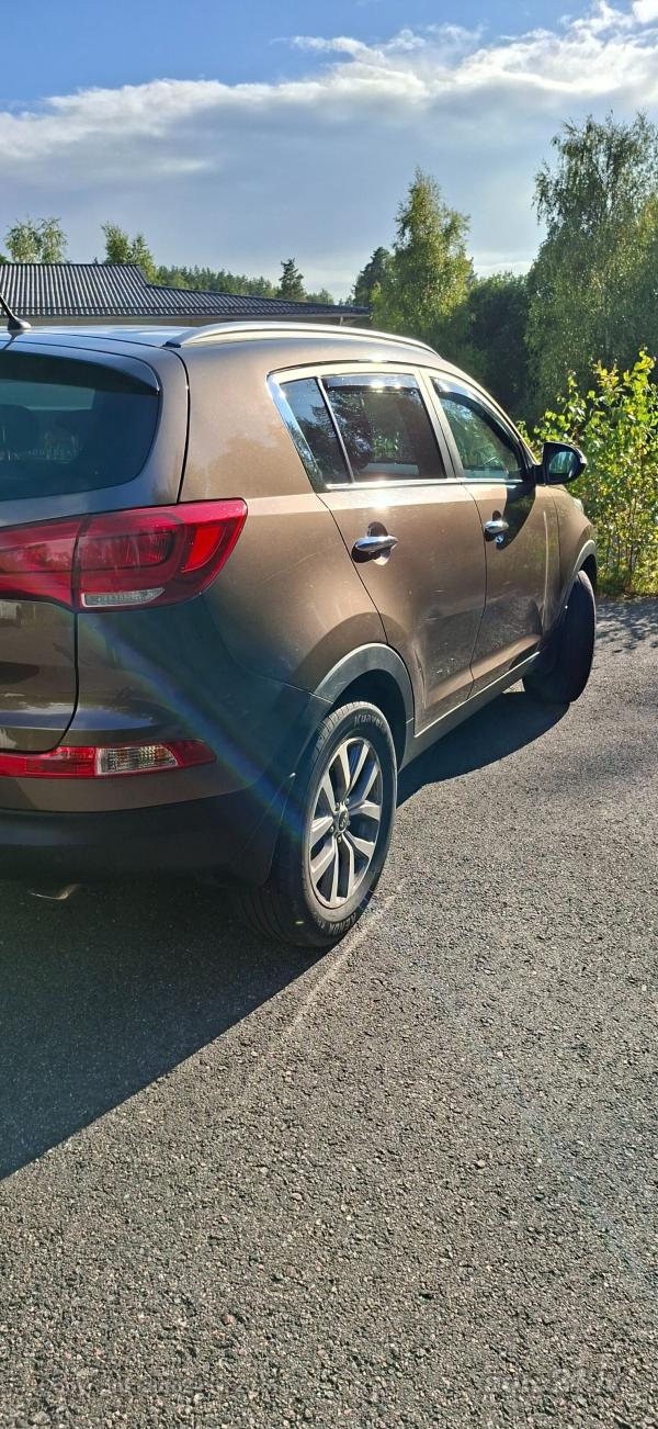Brūns Kia Sportage 2015 Tallina, ar dzinēja tilpumu 2.00 L un nobraukumu 125 tūkst. km par 9995 €, foto 5 vietnē AUTOMOTO.COM.LV