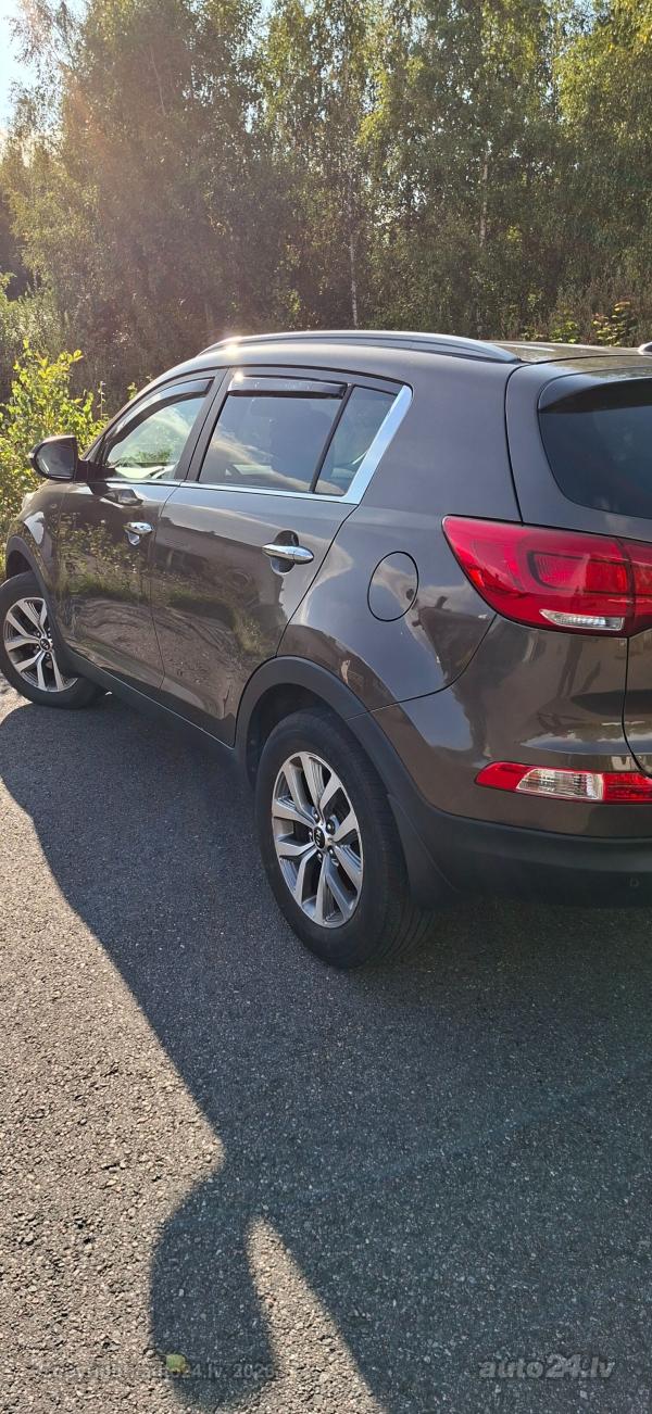 Brūns Kia Sportage 2015 Tallina, ar dzinēja tilpumu 2.00 L un nobraukumu 125 tūkst. km par 9995 €, foto 6 vietnē AUTOMOTO.COM.LV