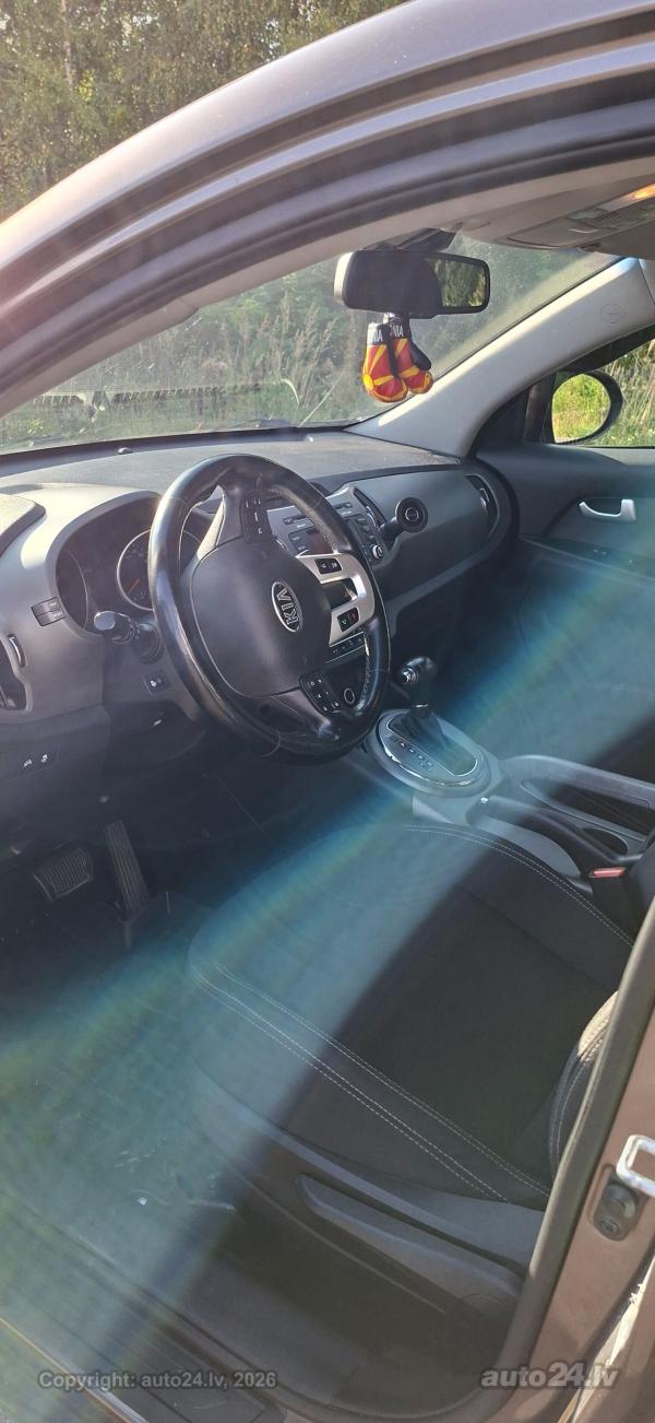 Brūns Kia Sportage 2015 Tallina, ar dzinēja tilpumu 2.00 L un nobraukumu 125 tūkst. km par 9995 €, foto 7 vietnē AUTOMOTO.COM.LV