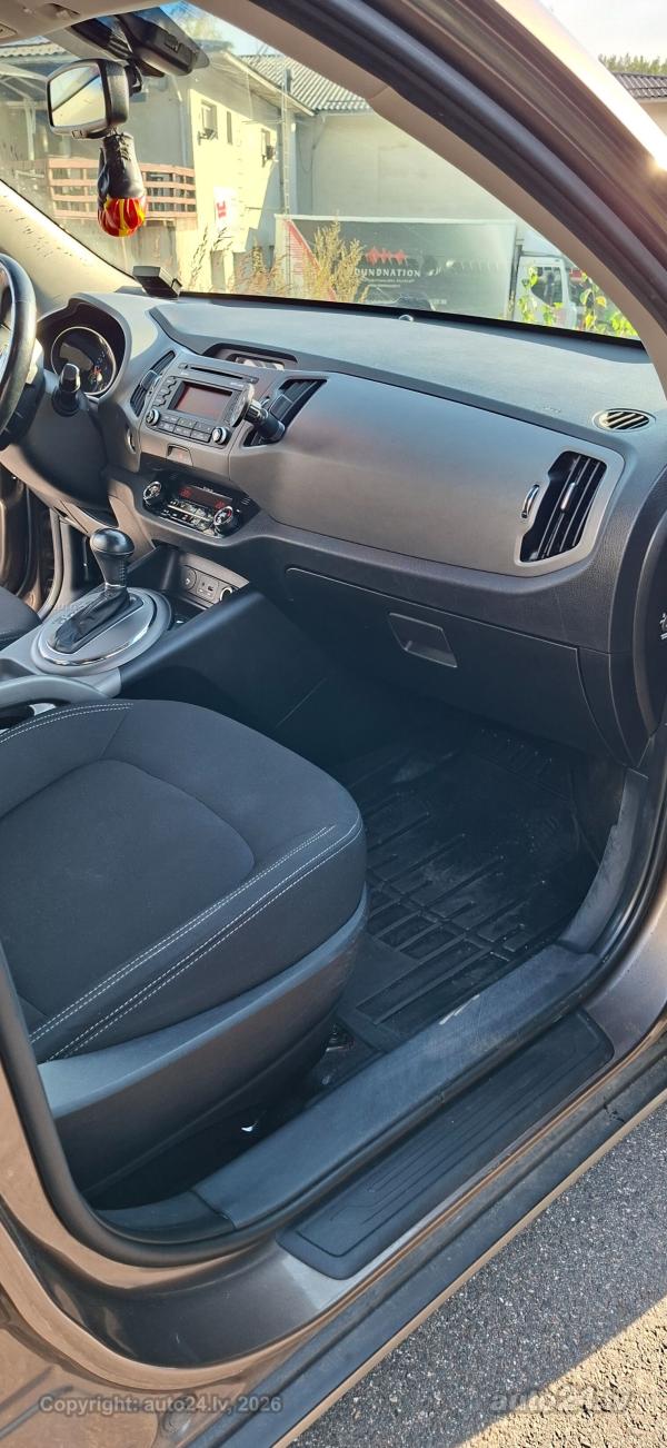 Brūns Kia Sportage 2015 Tallina, ar dzinēja tilpumu 2.00 L un nobraukumu 125 tūkst. km par 9995 €, foto 10 vietnē AUTOMOTO.COM.LV