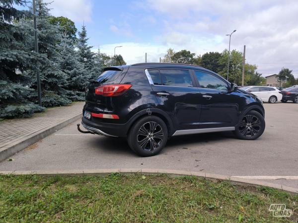 Kia Sportage 2012 in Kaunas, with an engine capacity of 2.00 L and mileage of 217 thousand km for 7300 €, photo 4 on AUTOMOTO.COM.LV