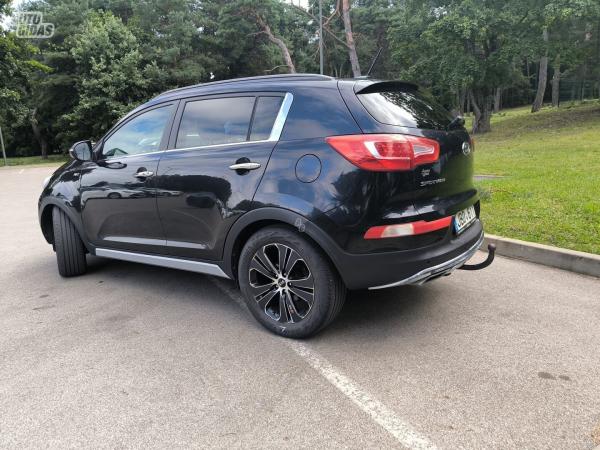 Kia Sportage 2012 in Kaunas, with an engine capacity of 2.00 L and mileage of 217 thousand km for 7300 €, photo 6 on AUTOMOTO.COM.LV