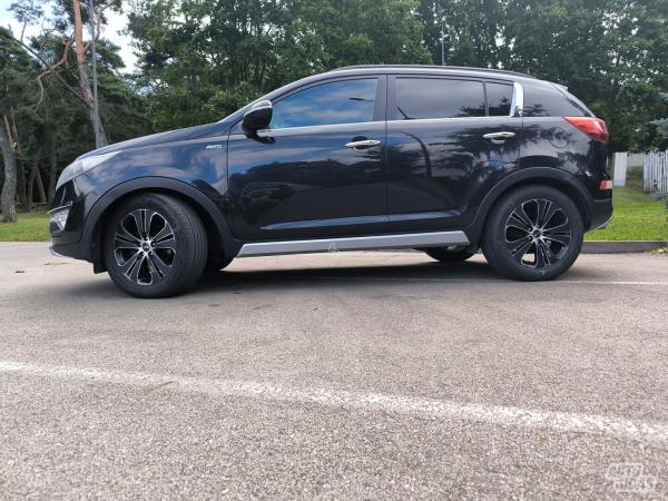 Kia Sportage 2012 in Kaunas, with an engine capacity of 2.00 L and mileage of 217 thousand km for 7300 €, photo 7 on AUTOMOTO.COM.LV