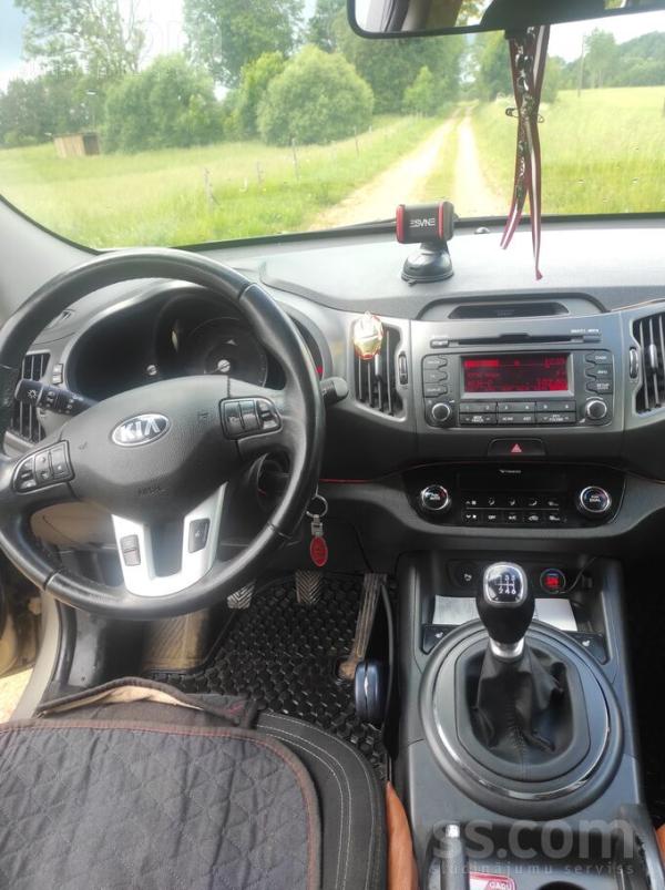 Kia Sportage 2013 in Kraslava, with an engine capacity of 1.70 L and mileage of 149 thousand km for 6700 €, photo 5 on AUTOMOTO.COM.LV