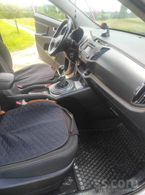 Kia Sportage 2013 in Kraslava, with an engine capacity of 1.70 L and mileage of 149 thousand km for 6700 €, photo 6 on AUTOMOTO.COM.LV